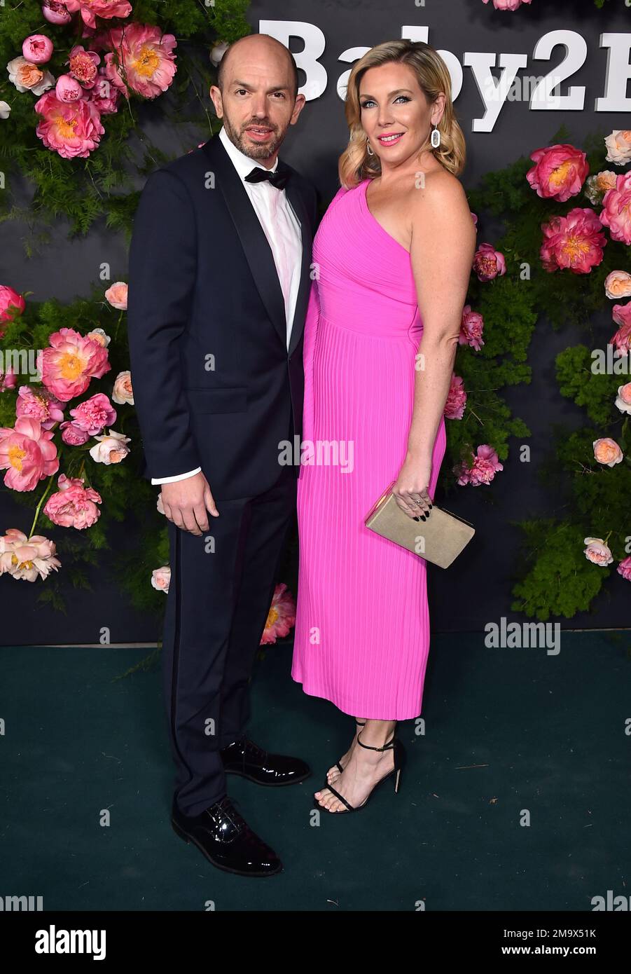 Paul Scheer, left, and June Diane Raphael arrive at the 2022 Baby2Baby ...