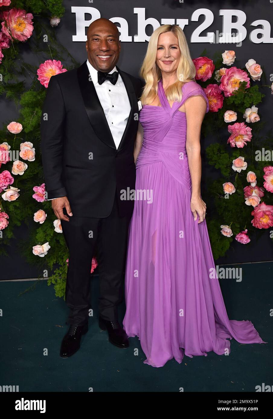 Byron Allen, left, and Jennifer Lucas arrive at the 2022 Baby2Baby Gala ...