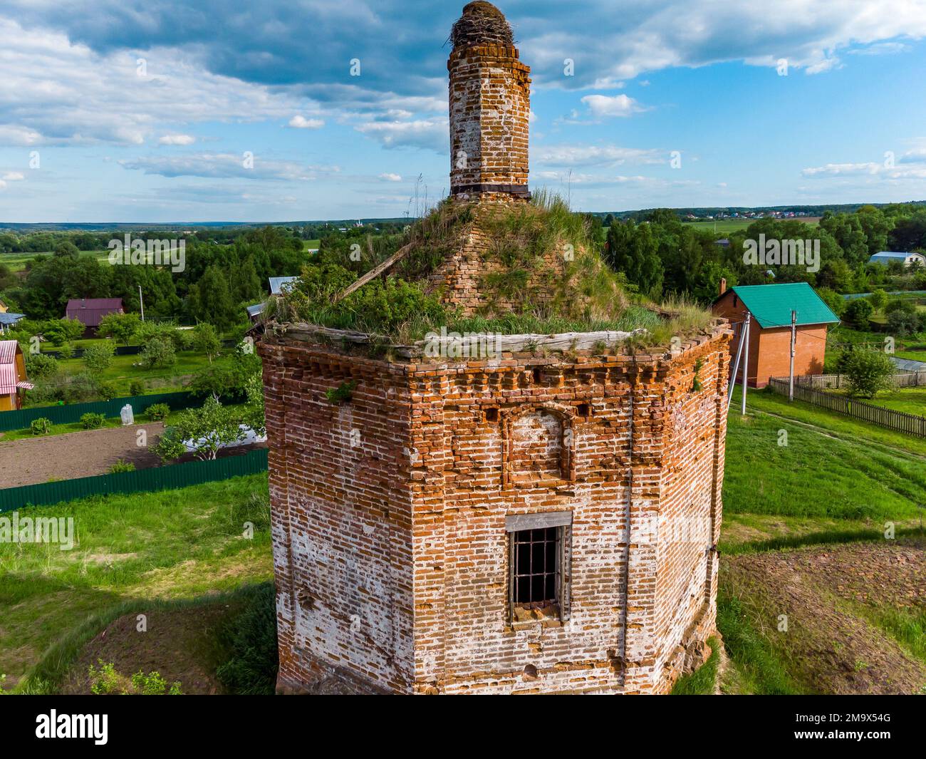 Aerial view of the overgrown ruins of an ancient Orthodox church in the ...