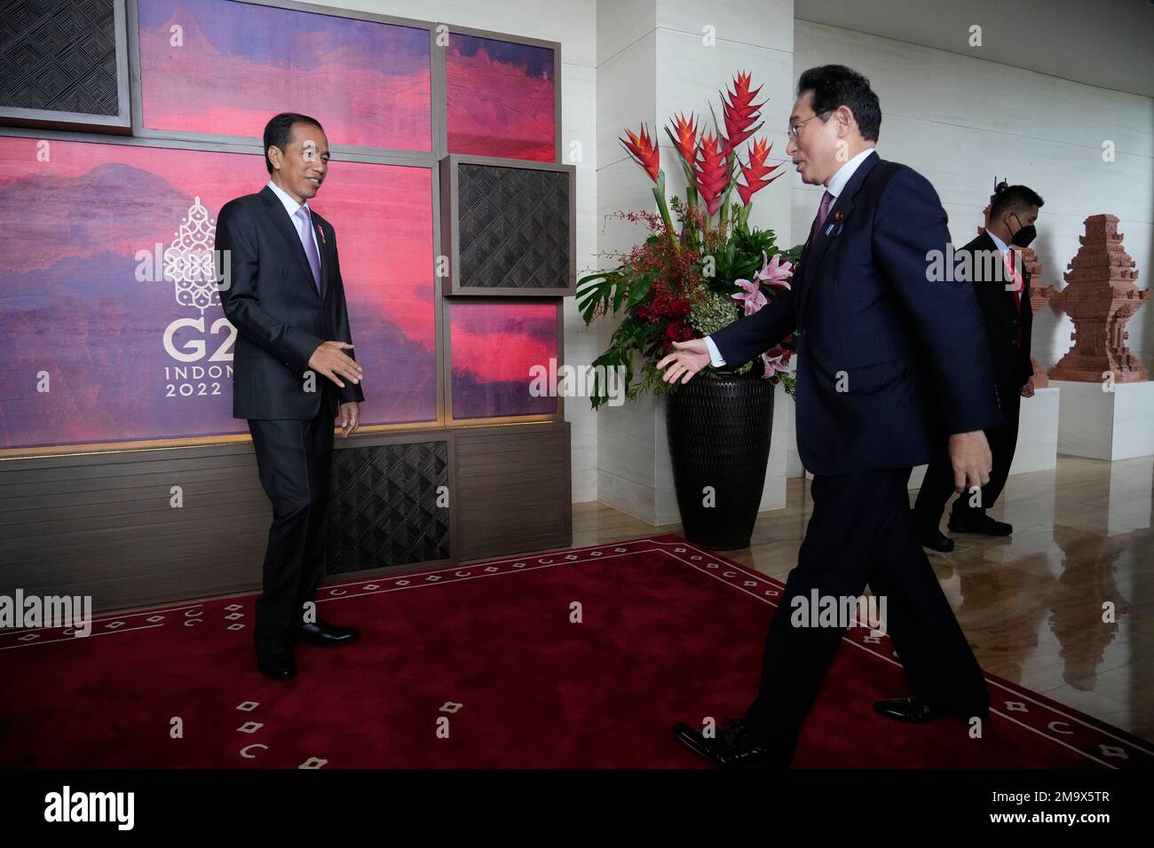 Indonesian President Joko Widodo, left, greets Japanese Prime Minister ...