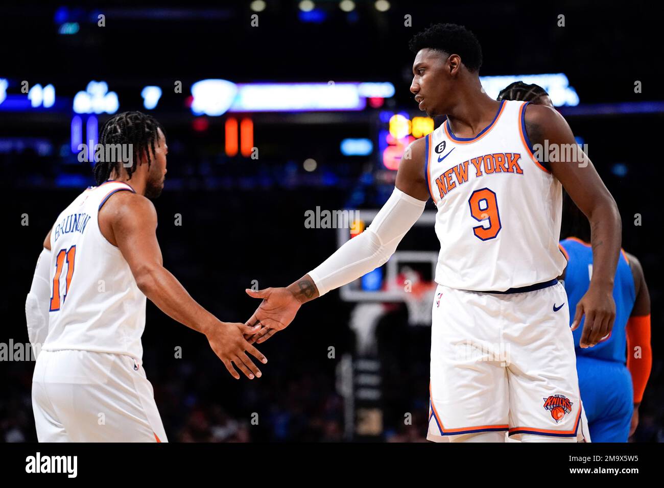 New York Knicks guard Jalen Brunson (11) and guard RJ Barrett (9) high ...