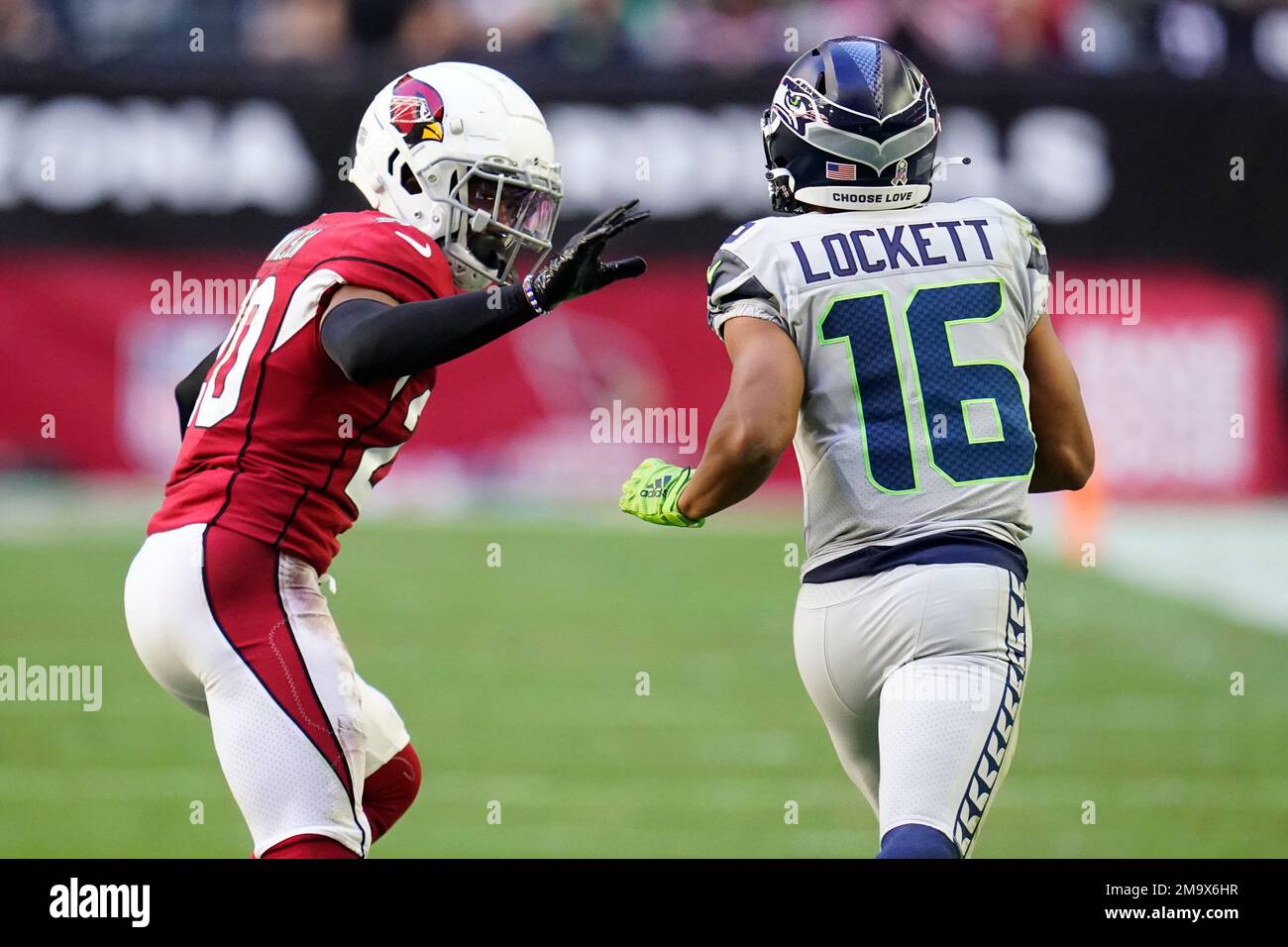 Arizona Cardinals cornerback Marco Wilson, left, covers Seattle ...
