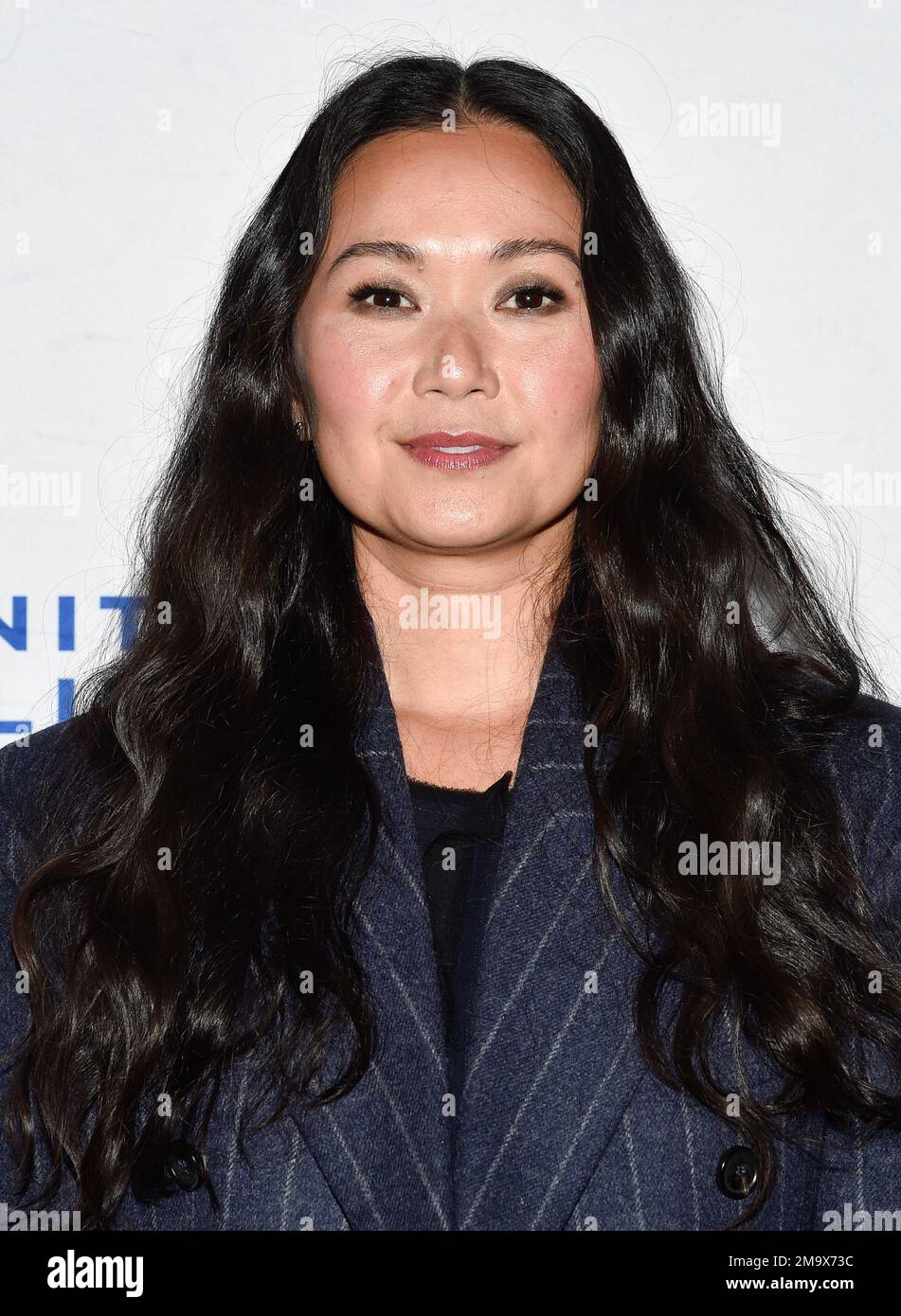 Hong Chau poses before discussing "The Menu" on stage at the 92nd ...