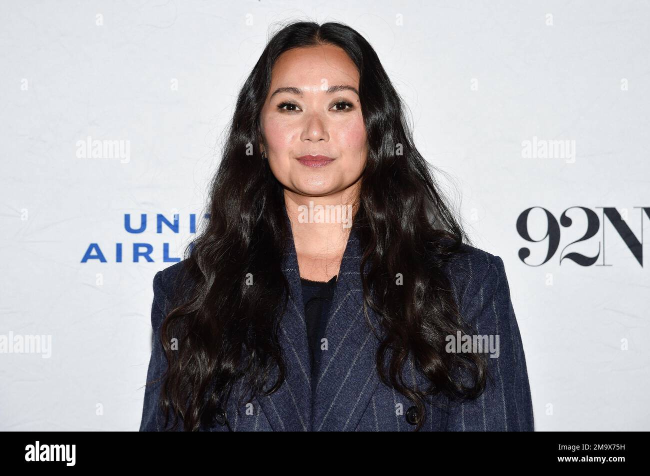 Hong Chau poses before discussing "The Menu" on stage at the 92nd ...