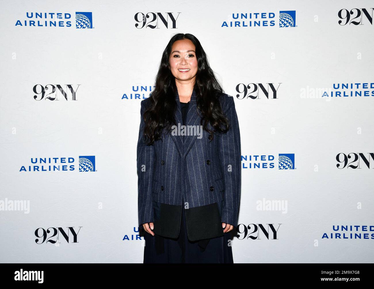 Hong Chau poses before discussing "The Menu" on stage at the 92nd ...