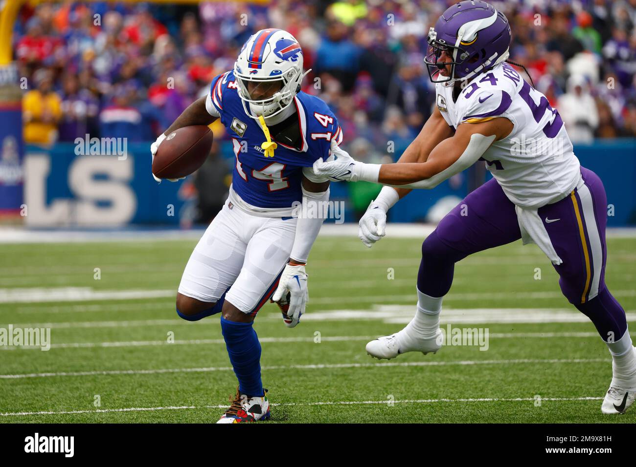 Buffalo Bills wide receiver Stefon Diggs (14) is brought down by ...