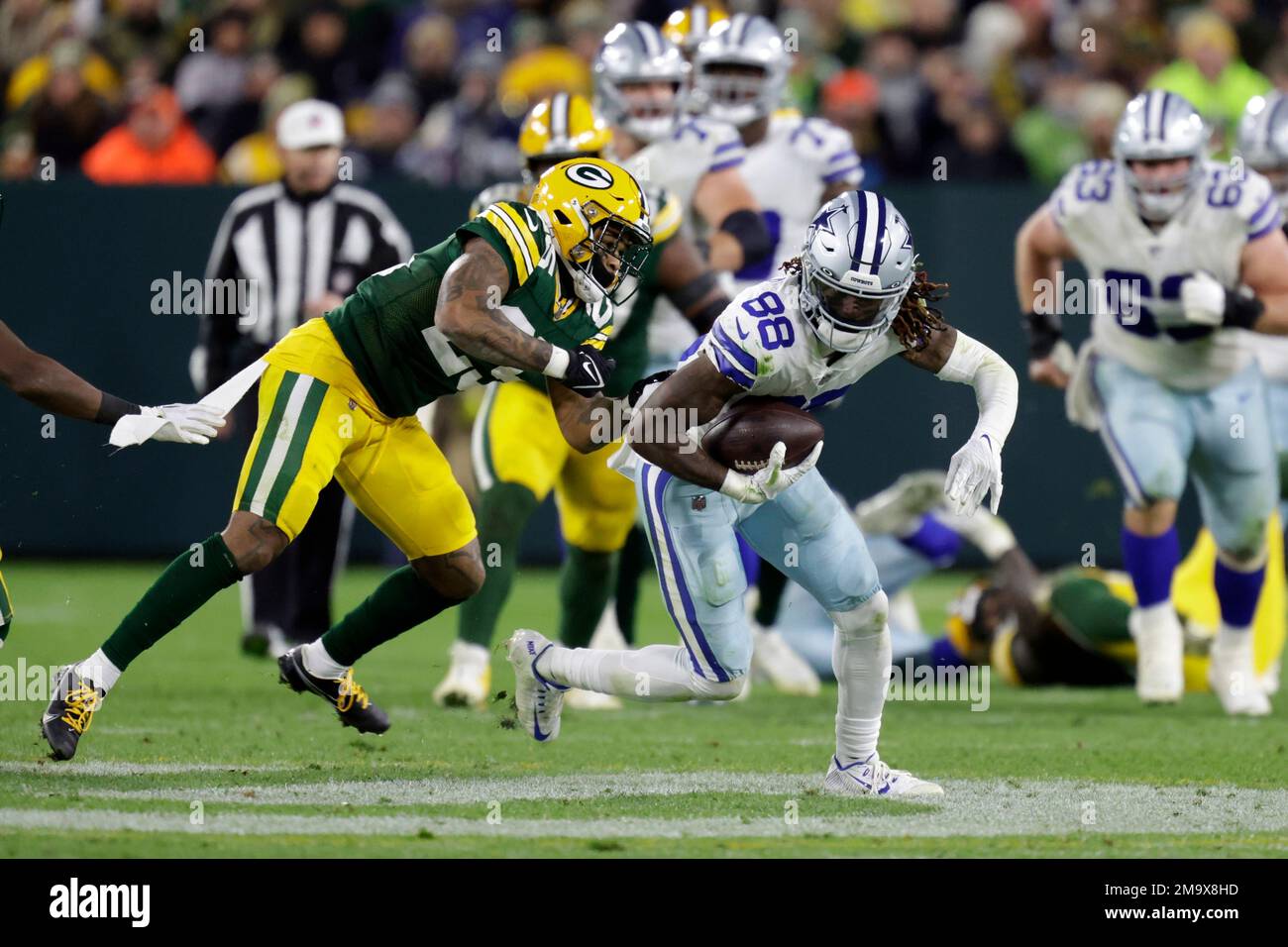 Dallas Cowboys wide receiver CeeDee Lamb (88) is stopped after catching ...