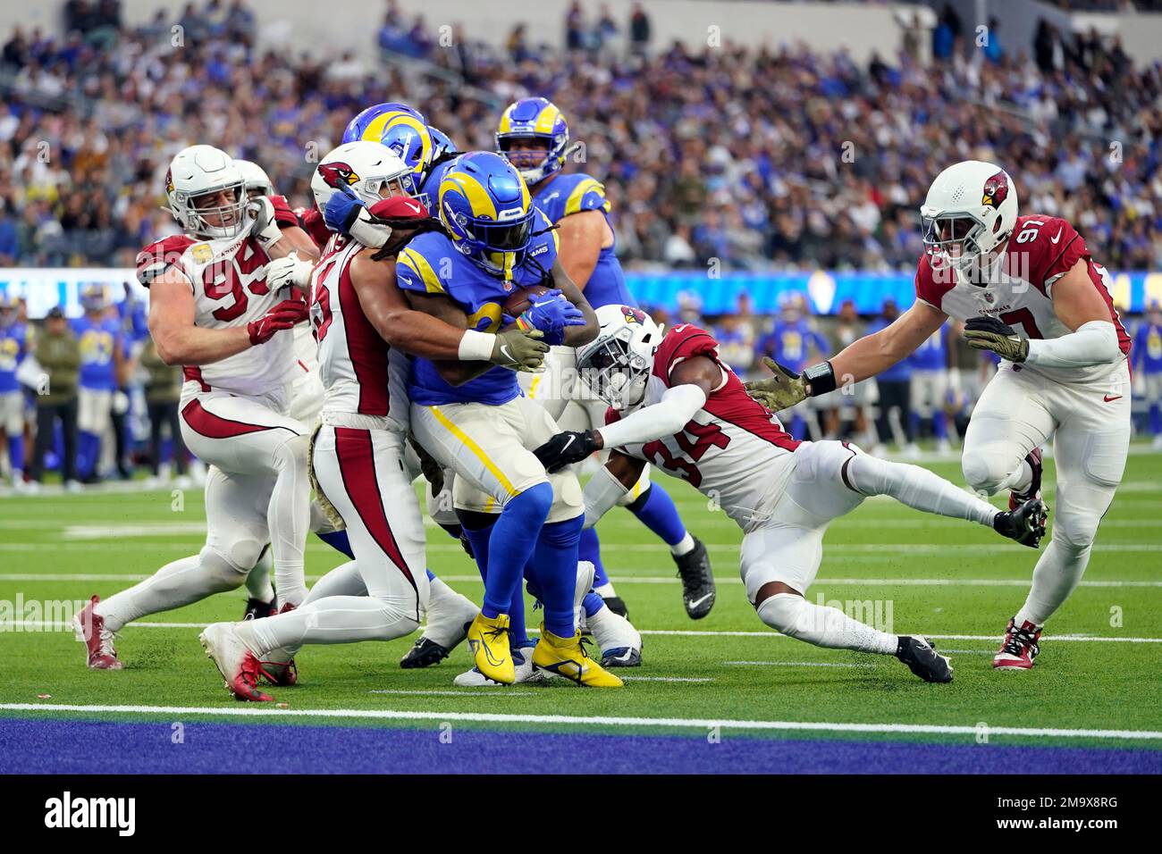 Los Angeles Rams running back Darrell Henderson Jr., center, scores a ...