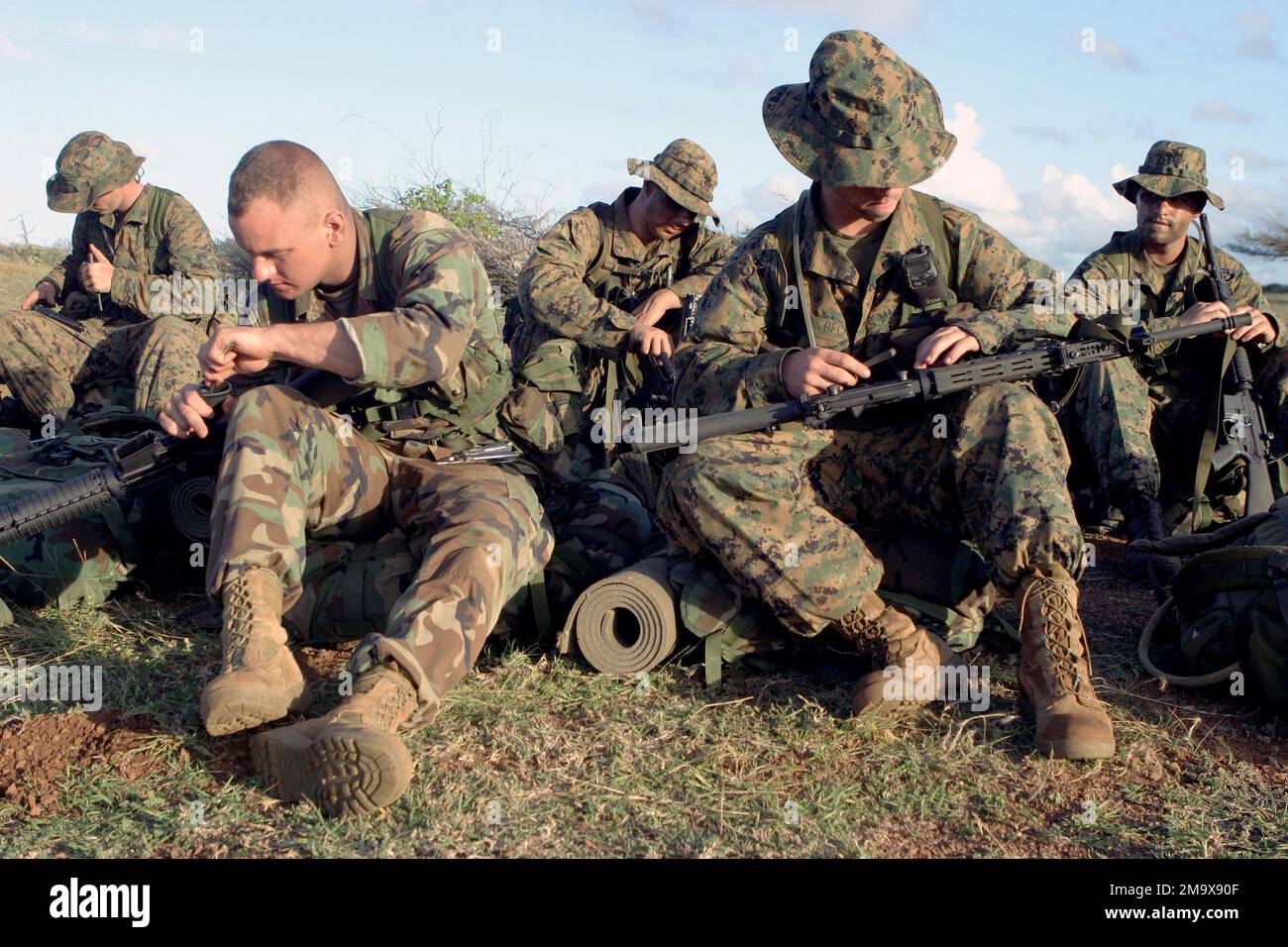 US Marine Corps (USMC) personnel with Kilo Company, 3rd Battalion, 25th ...