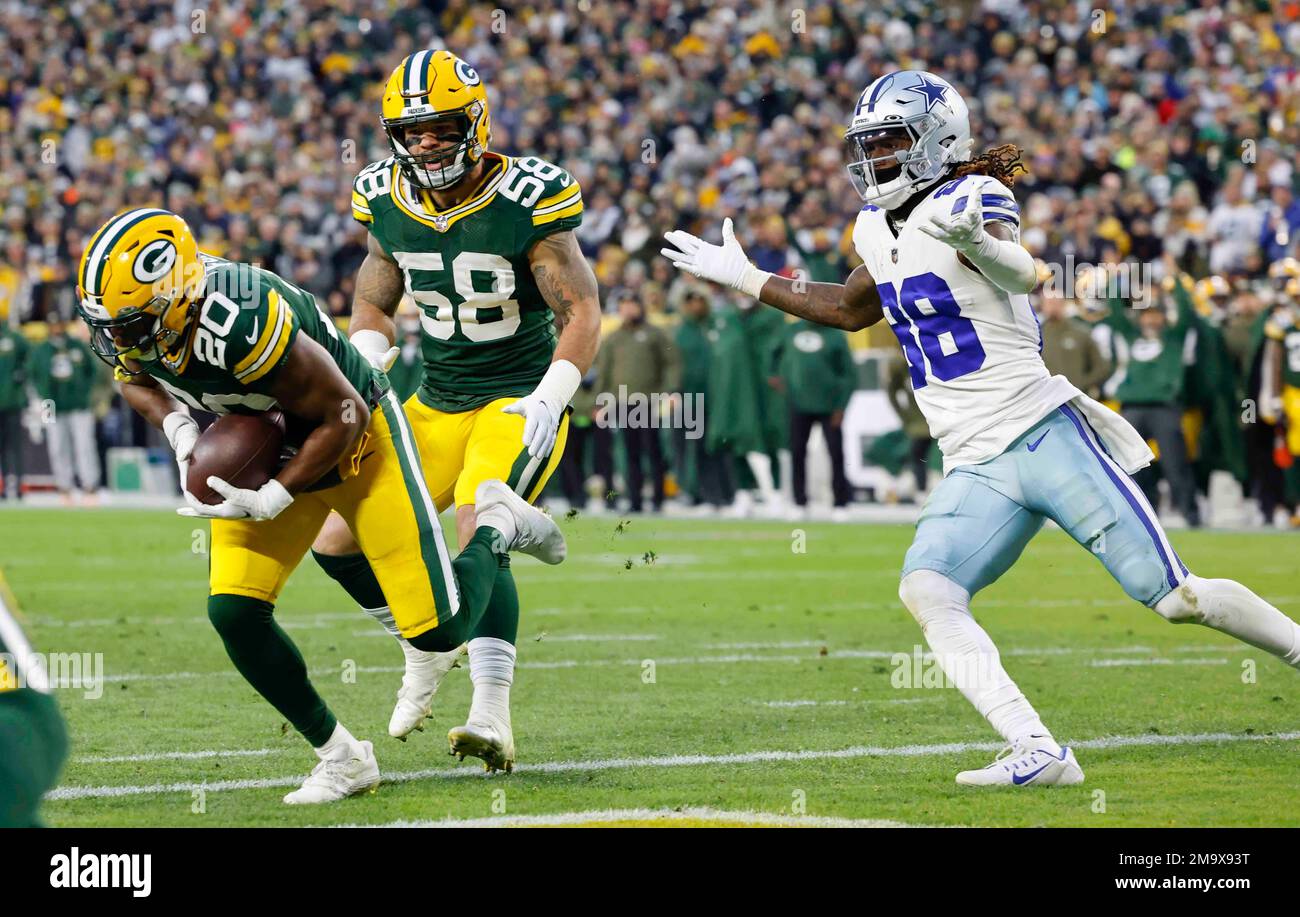Green Bay Packers safety Rudy Ford (20) intercepts a ball intended for ...
