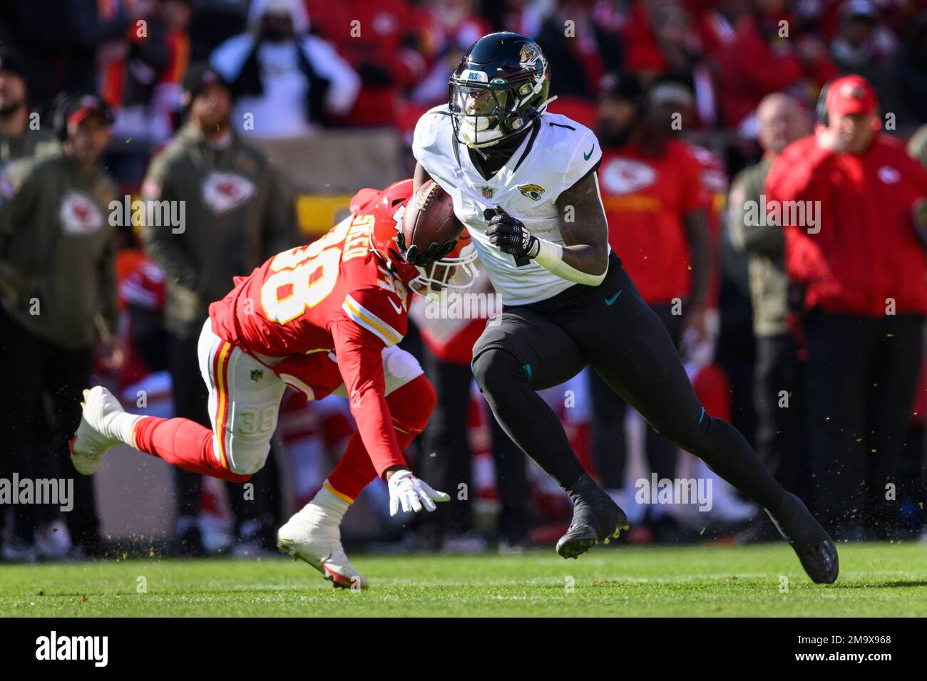 Jacksonville Jaguars running back Travis Etienne Jr. (1) carries the ...