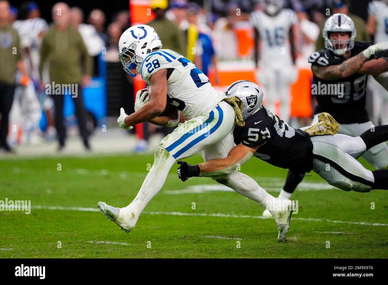 Indianapolis Colts running back Jonathan Taylor (28) is tackled by Las ...
