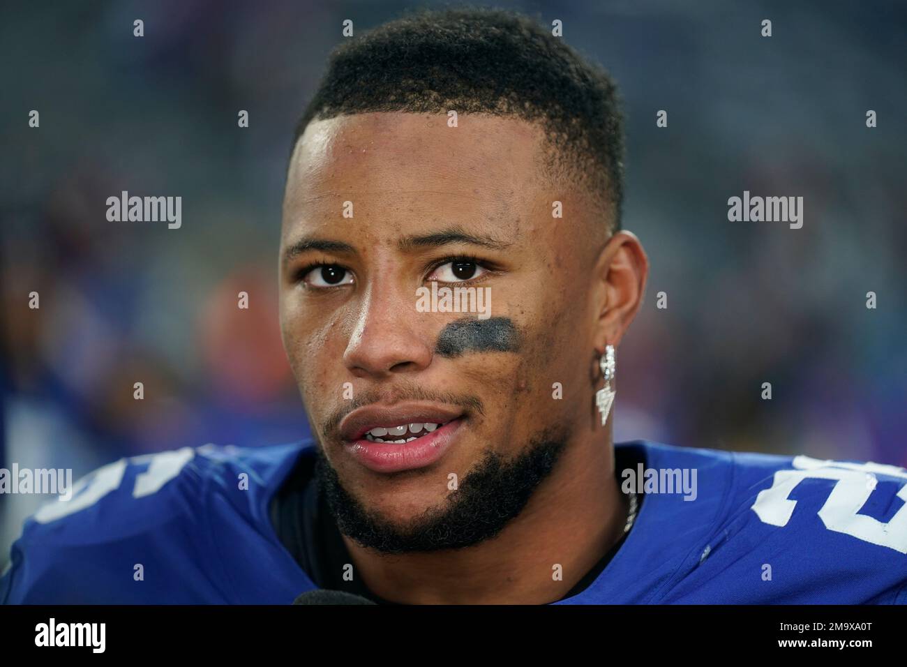 New York Giants running back Saquon Barkley (26) walks off the field ...