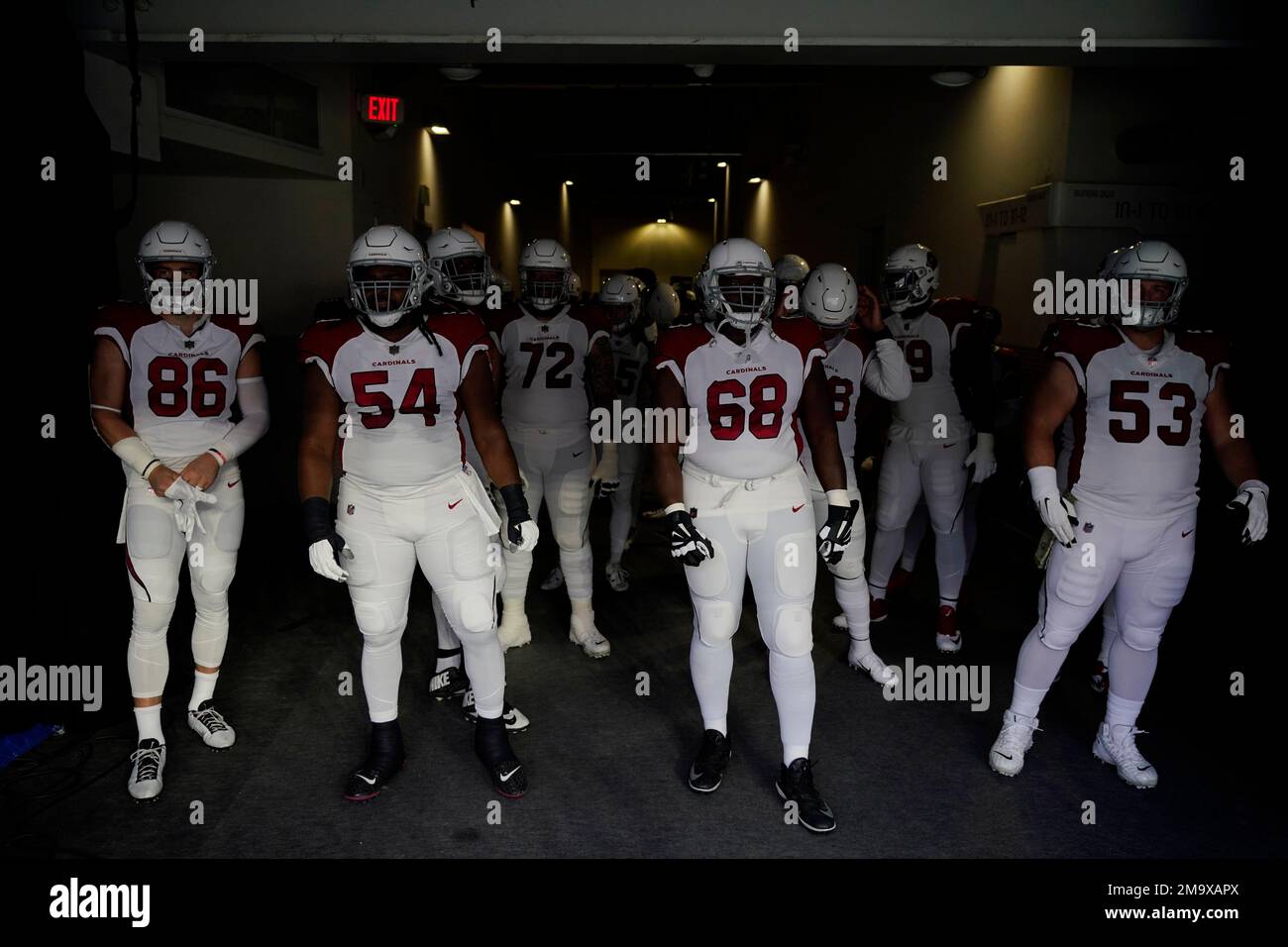 The Arizona Cardinals prepare to enter the field before an NFL football ...