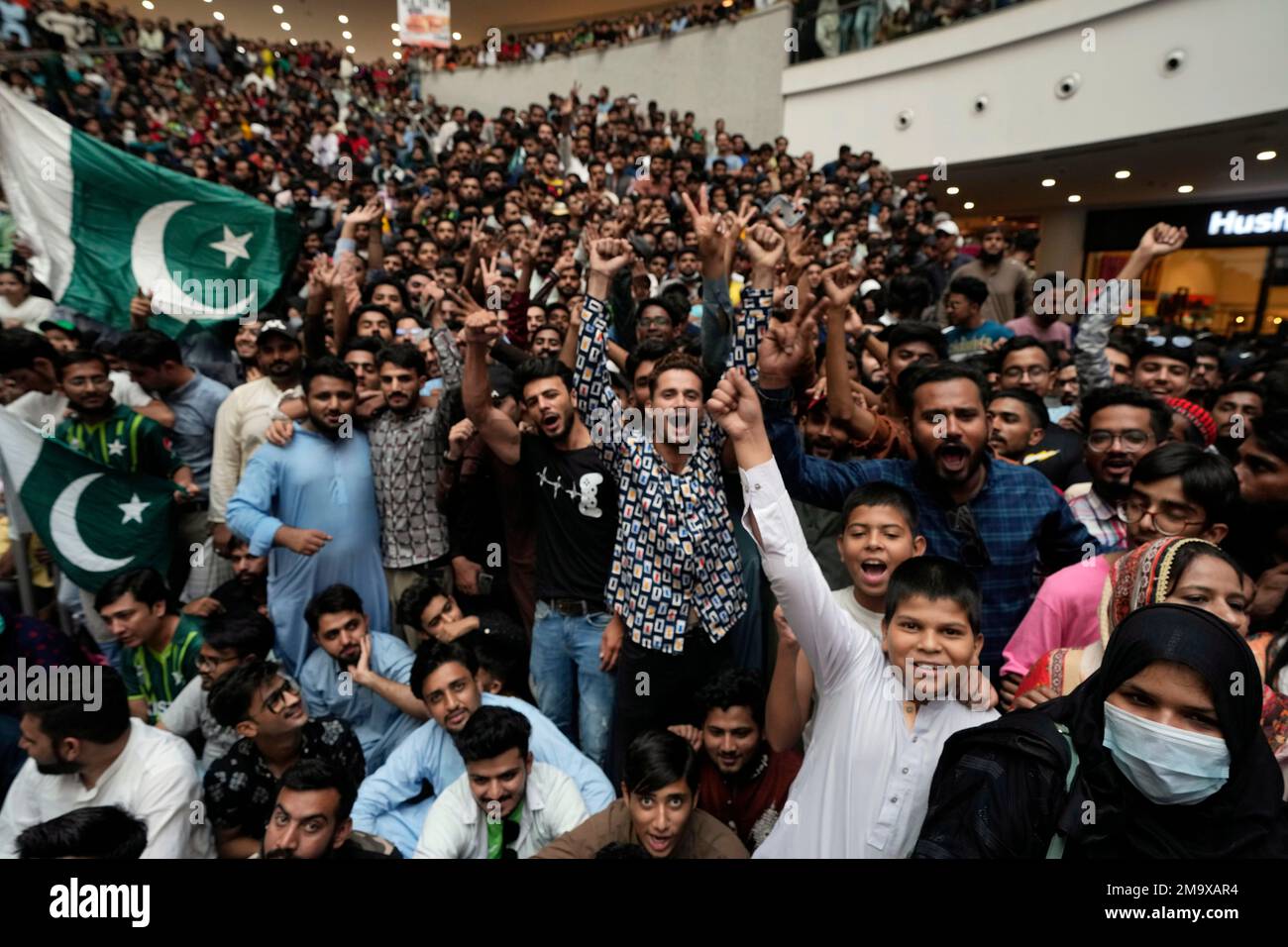 Pakistani cricket fans cheer while they watch the finals match between ...