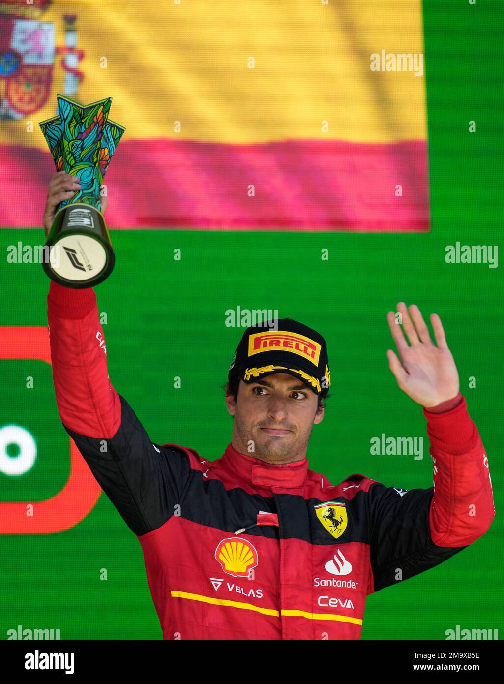 Ferrari driver Carlos Sainz, of Spain, celebrates his third-place ...