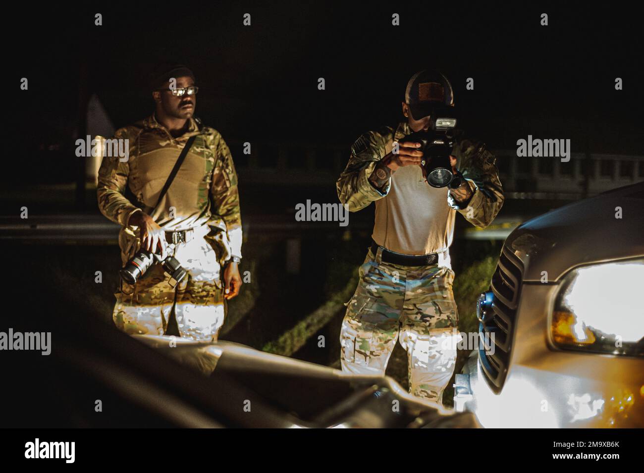 U.S. Army Sgt. Sidney Perry and Cpl. Trevor Franklin, assigned to 55th ...