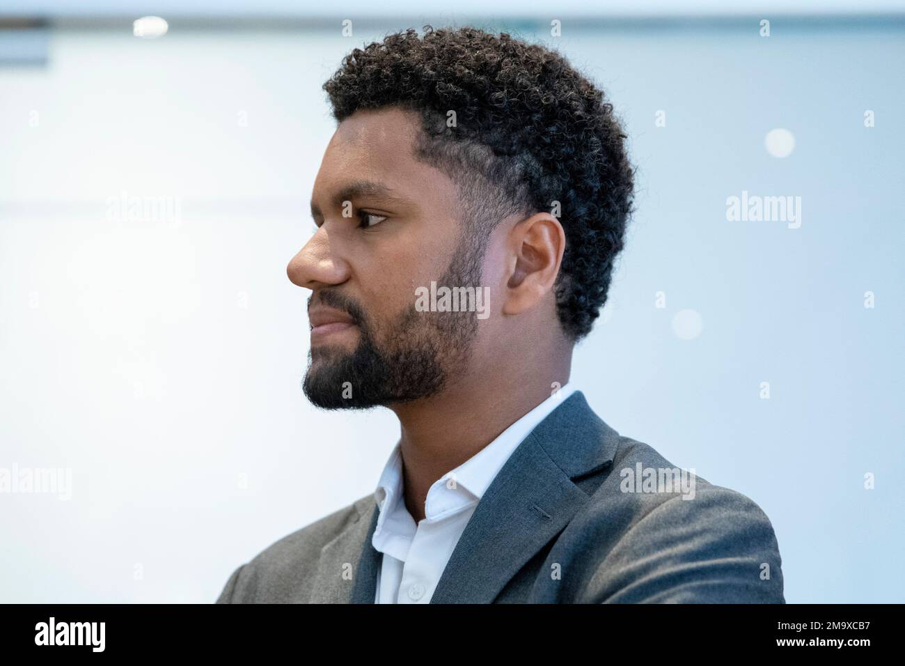 Rep.-elect Maxwell Frost, D-Fla., listens during a news conference with ...