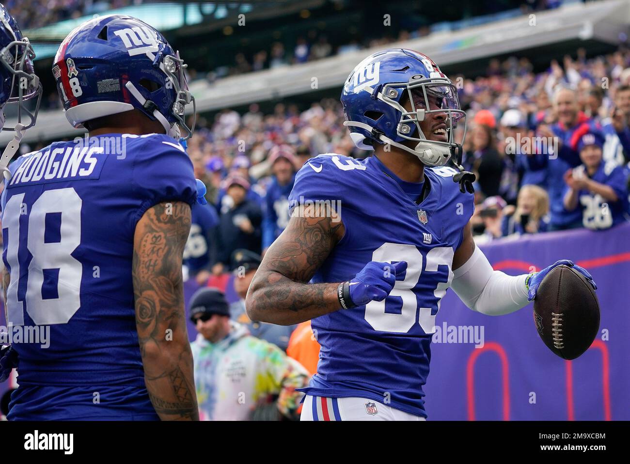 New York Giants tight end Lawrence Cager (83) celebrates after scoring ...