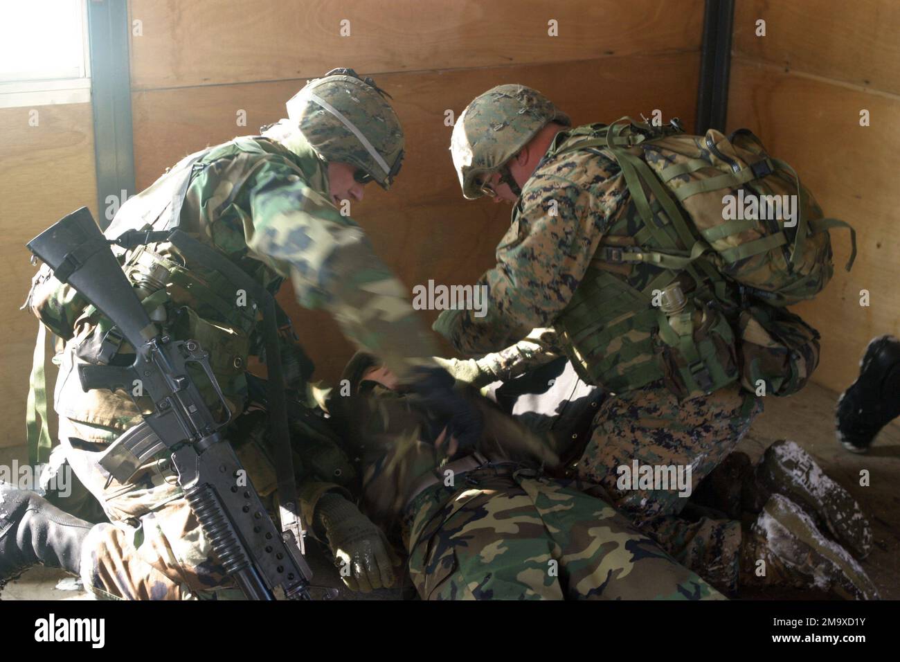 040210-M-8205V-008. [Complete] Scene Caption: US Military personnel ...