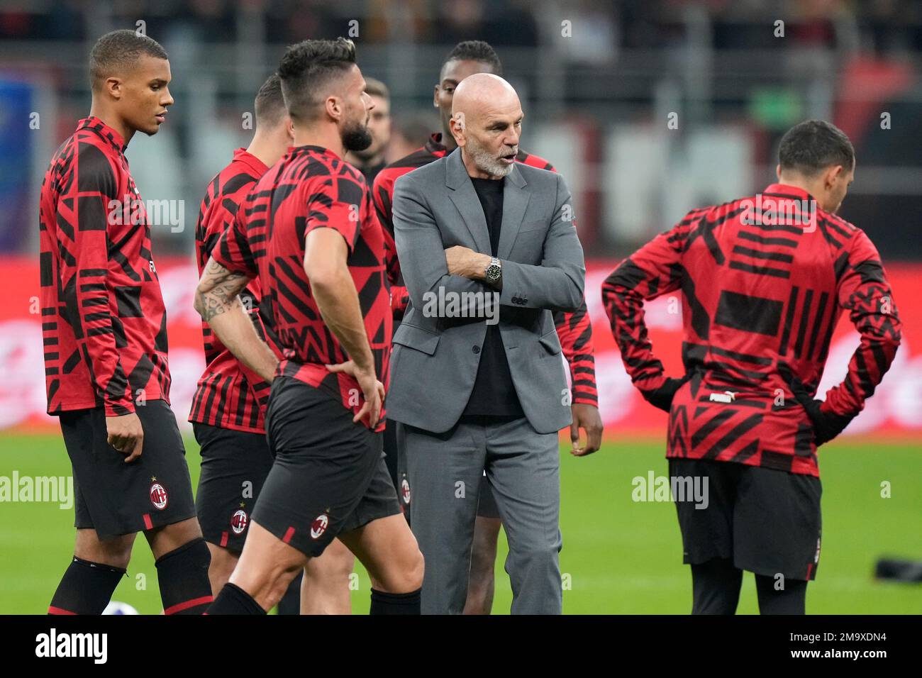 AC Milan's manager Stefano Pioli talks to team players prior to the ...