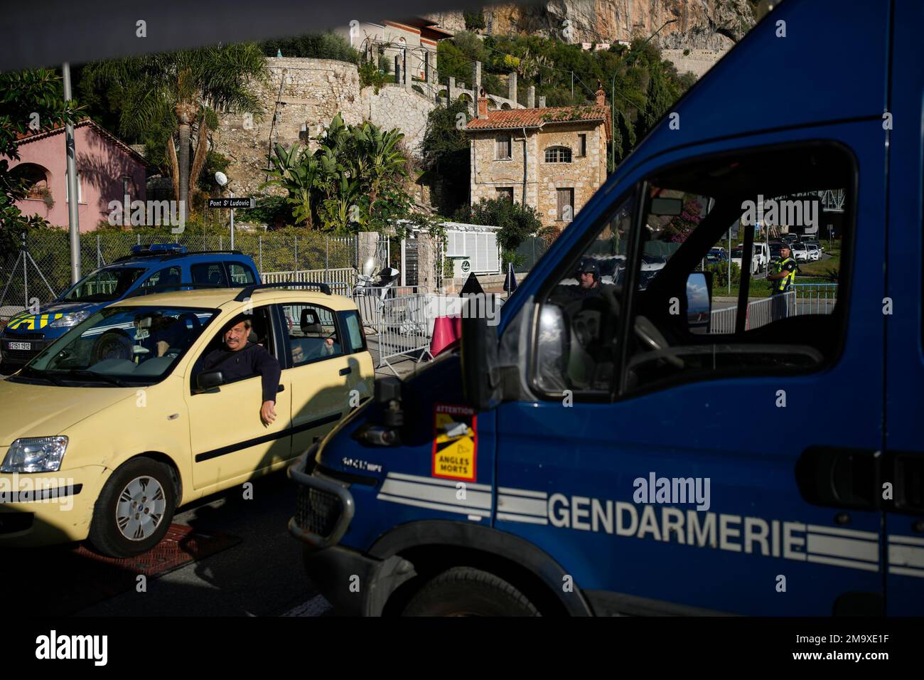 Cars line up for police checks before entering France from Italy at a ...