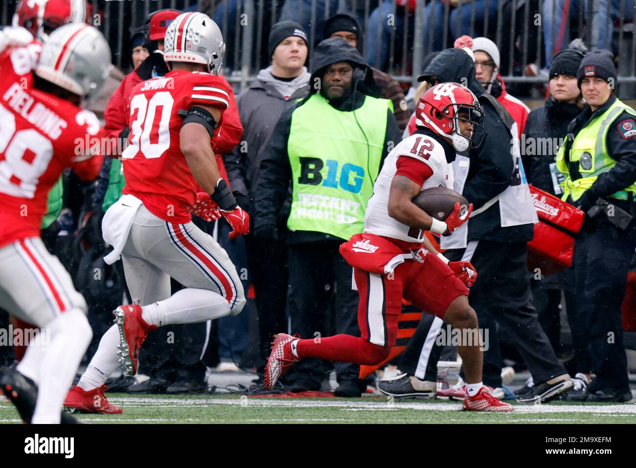 Indiana running back Jaylin Lucas, right, runs past Ohio State ...