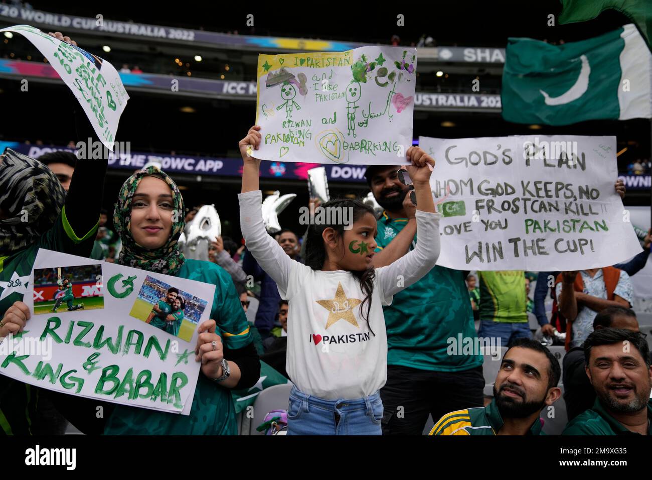Pakistani supporters display placards before the start of the final of ...