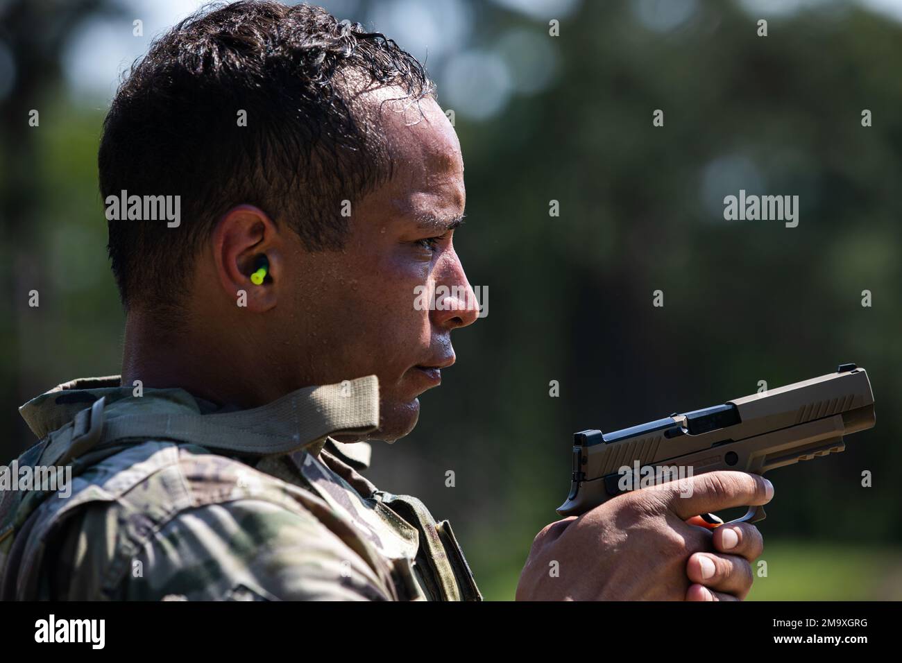 U.S. Army Spc. Joshua Cowden, a visual information specialist assigned ...
