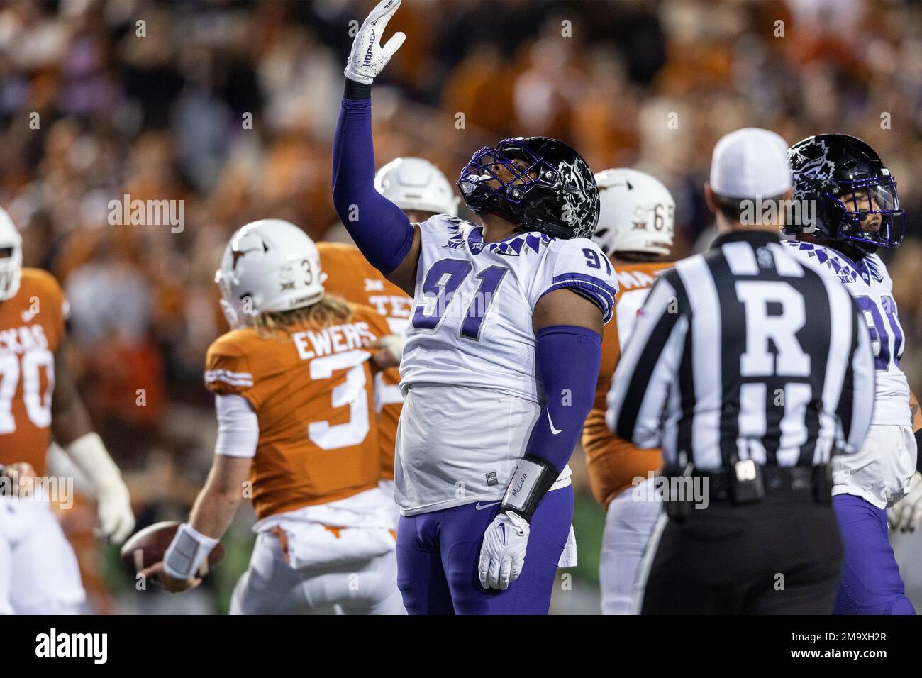 TCU defensive lineman Tymon Mitchell (91) celebrates a sack of Texas ...