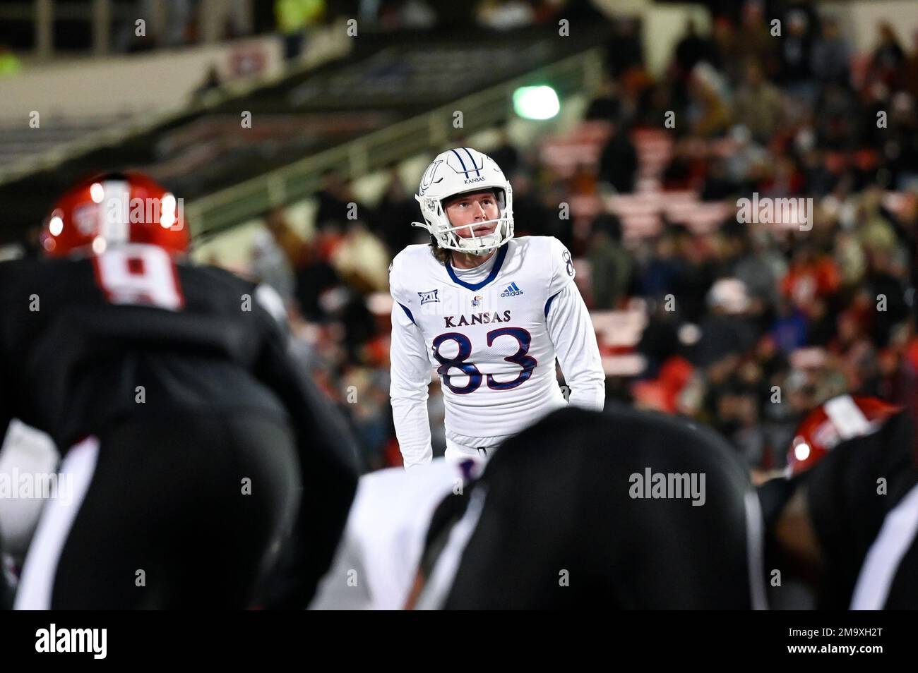 Kansas placekicker Jacob Borcila (83) sets up to boot an extra point ...