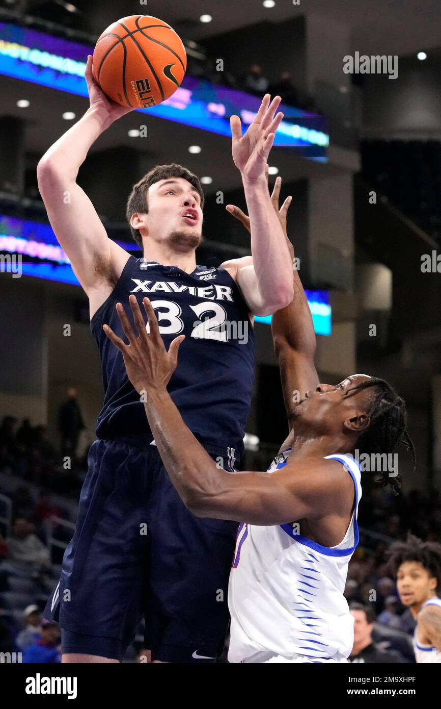 Xavier's Zach Freemantle shoots over DePaul's Eral Penn during the ...