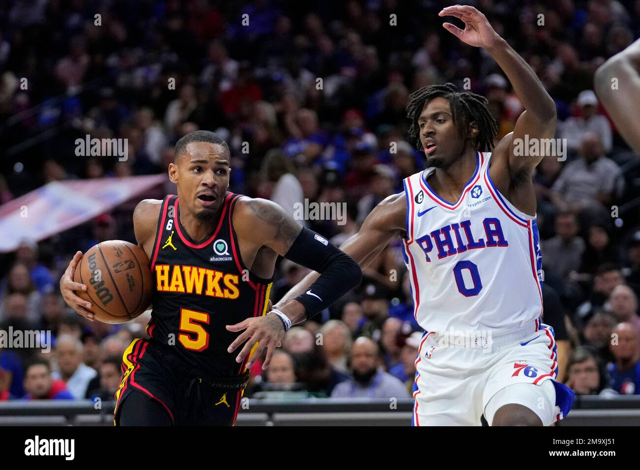 Atlanta Hawks' Dejounte Murray, left, tries to get past Philadelphia ...