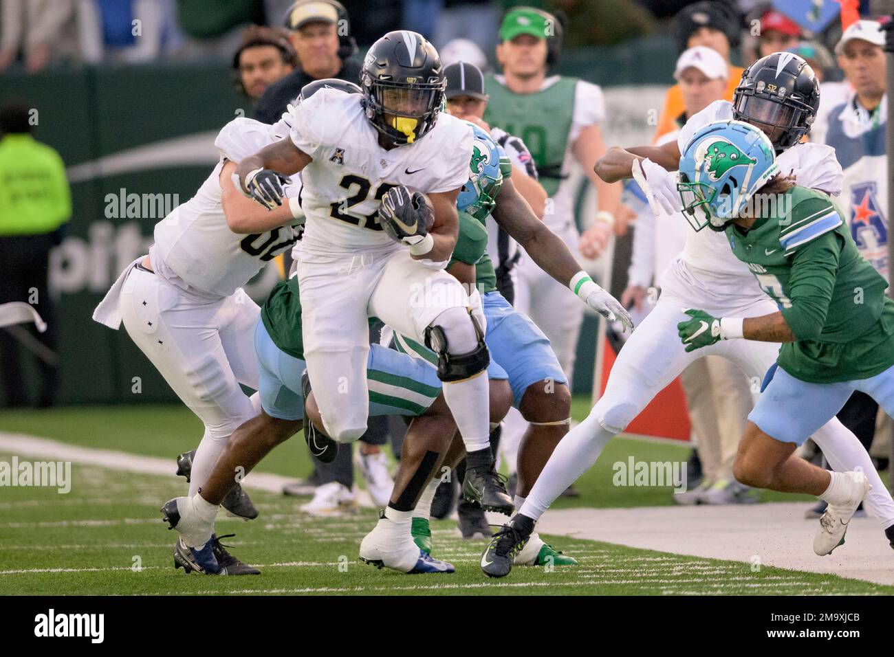 UCF running back RJ Harvey runs against Tulane during the second half ...
