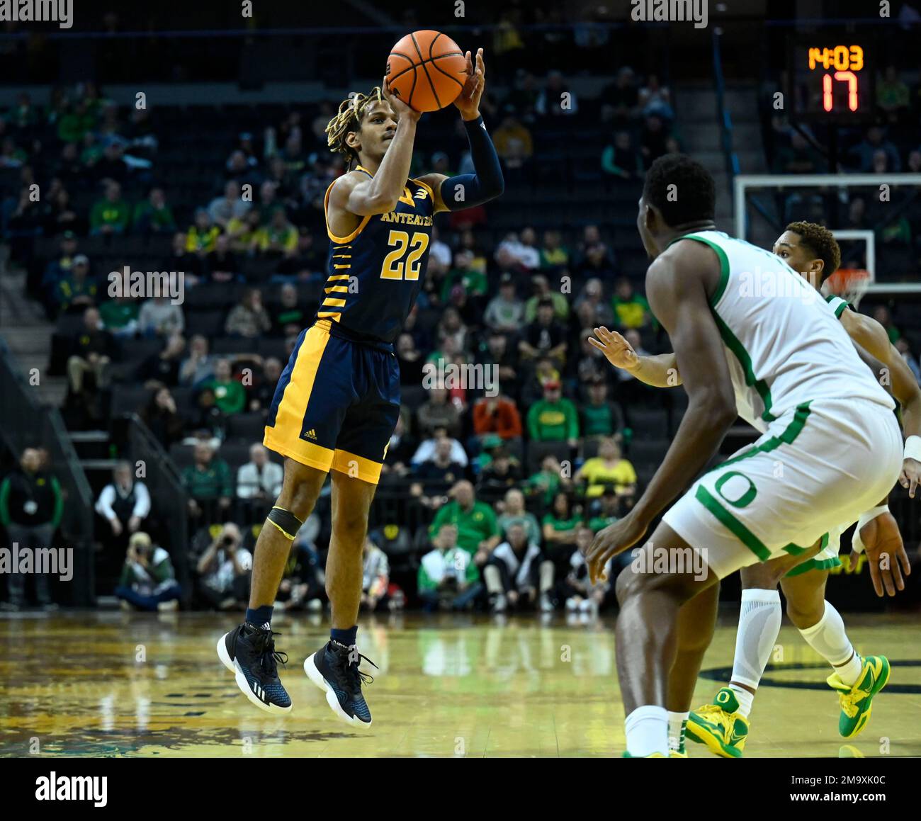UC Irvine guard DJ Davis (22) shoots over Oregon center N'Faly Dante (1 ...