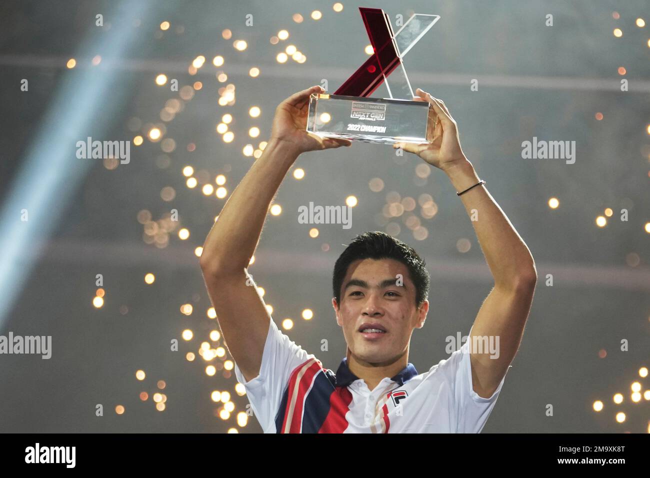 Winner United States' Brandon Nakashima holds a trophy during a medal ...