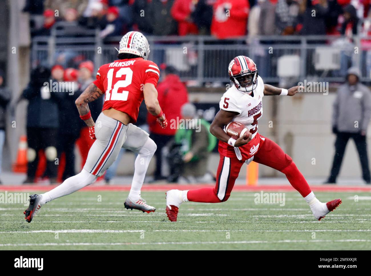 Indiana quarterback Dexter Williams, right, tries to get past Ohio ...