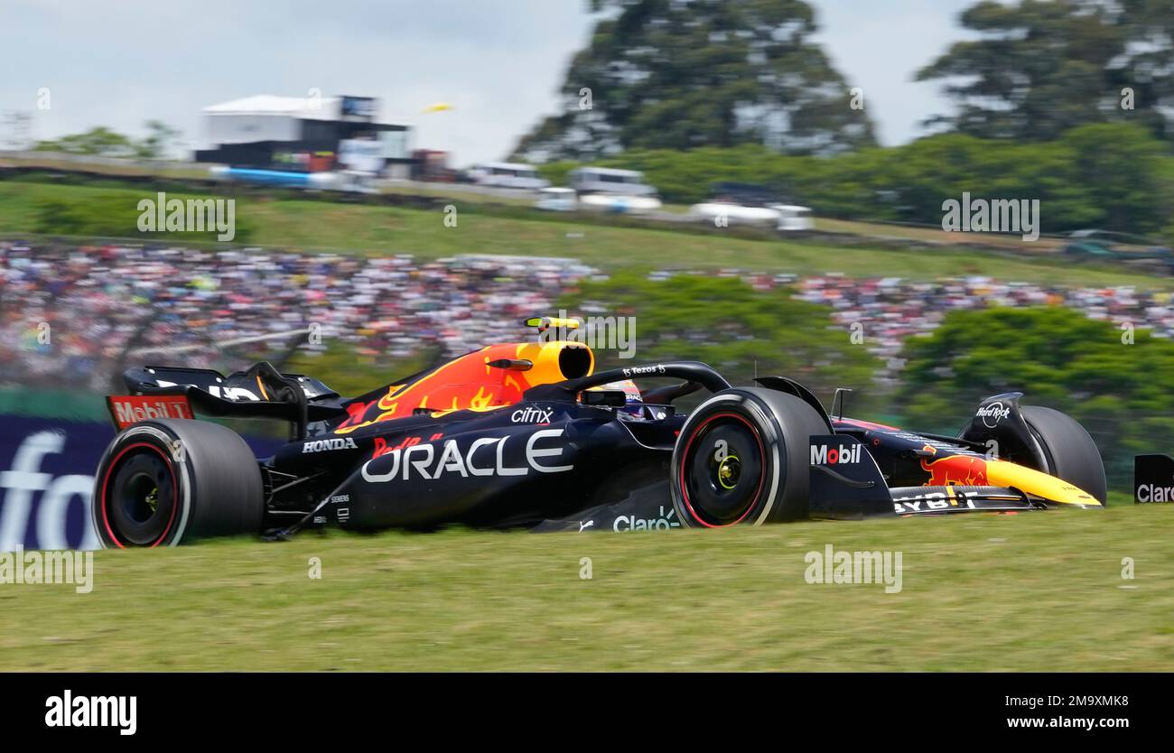 Red Bull driver Sergio Perez, of Mexico, steers his car during the second practice session at ...