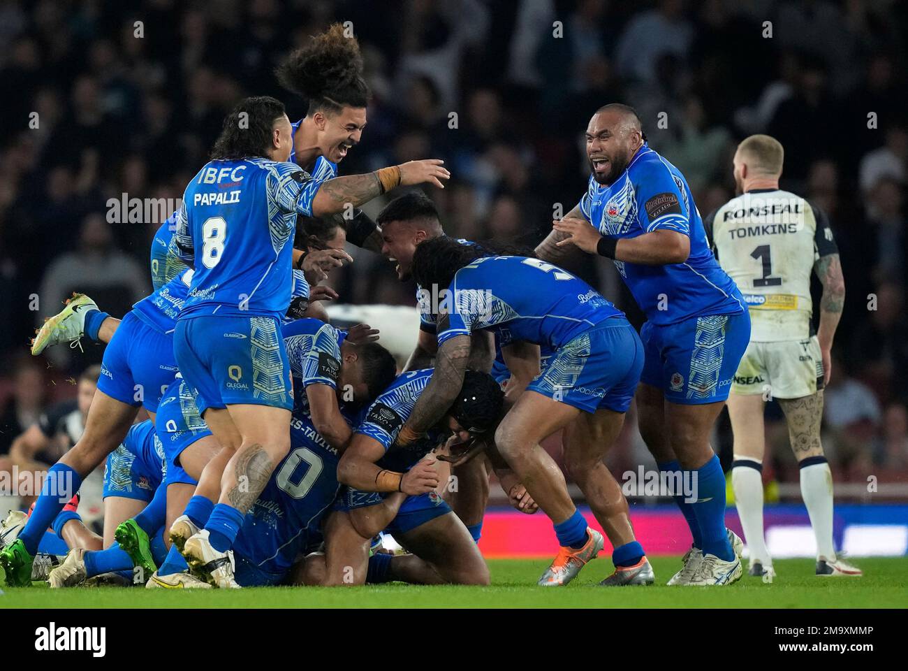 Samoa's players celebrates at the end of the Rugby League World Cup ...
