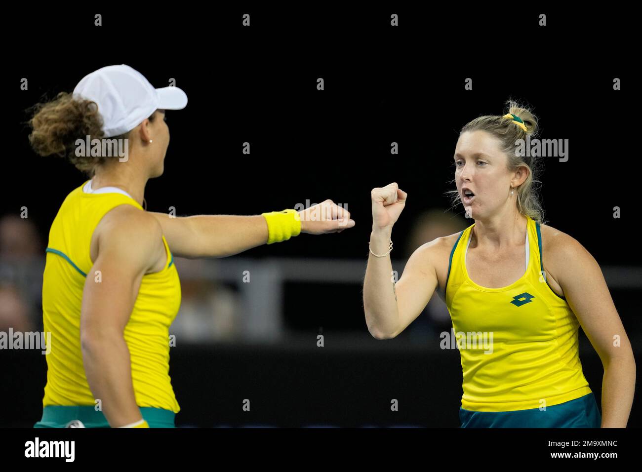 Storm Sanders, right, and Samantha Stosur of Australia gesture during ...