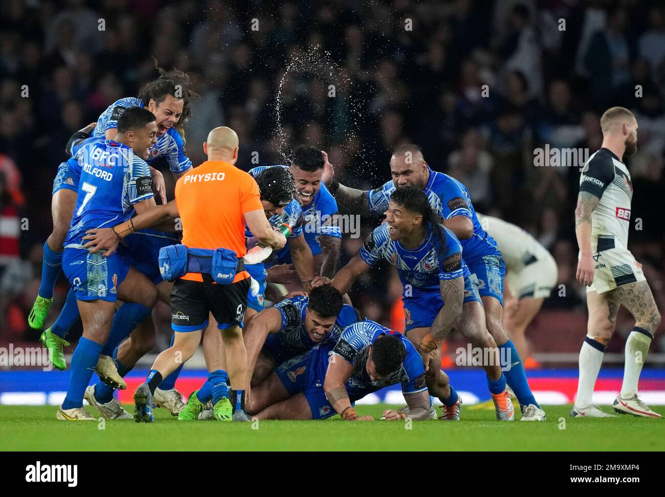 Samoa's players celebrates at the end of the Rugby League World Cup ...