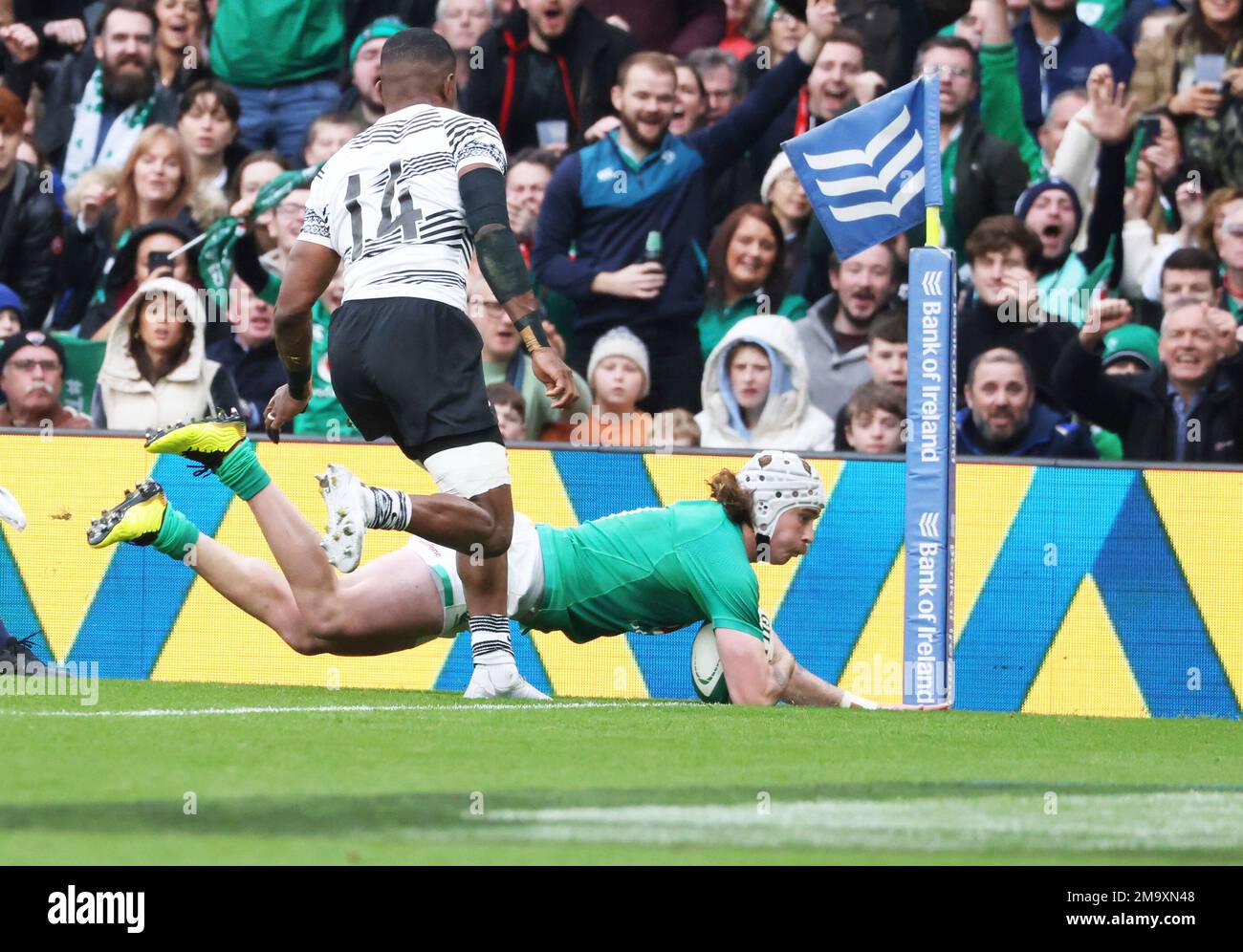 Ireland's Mack Hansen scores a try against Fiji during the rugby union ...