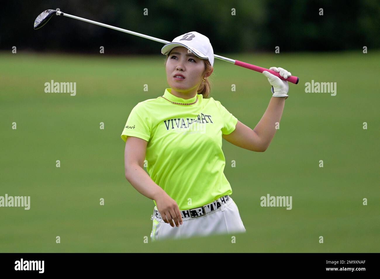 Ayaka Furue, of Japan, watches her shot from the eighth fairway during ...
