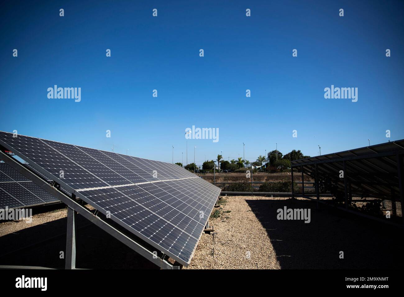 Solar panels are placed along a highway between Casablanca and ...