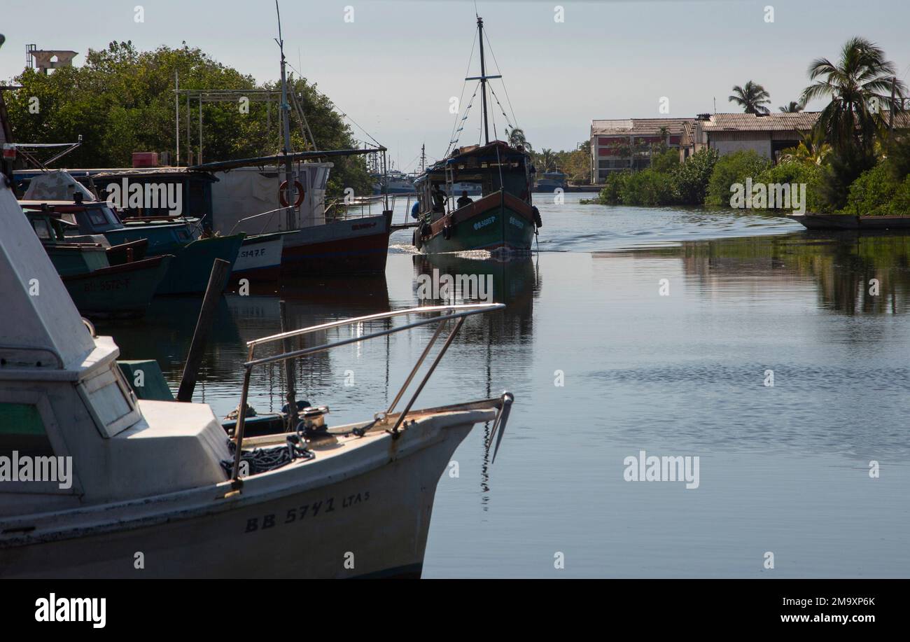 A boat arrives at the Surgidero de Batabano, where fishermen's boats ...