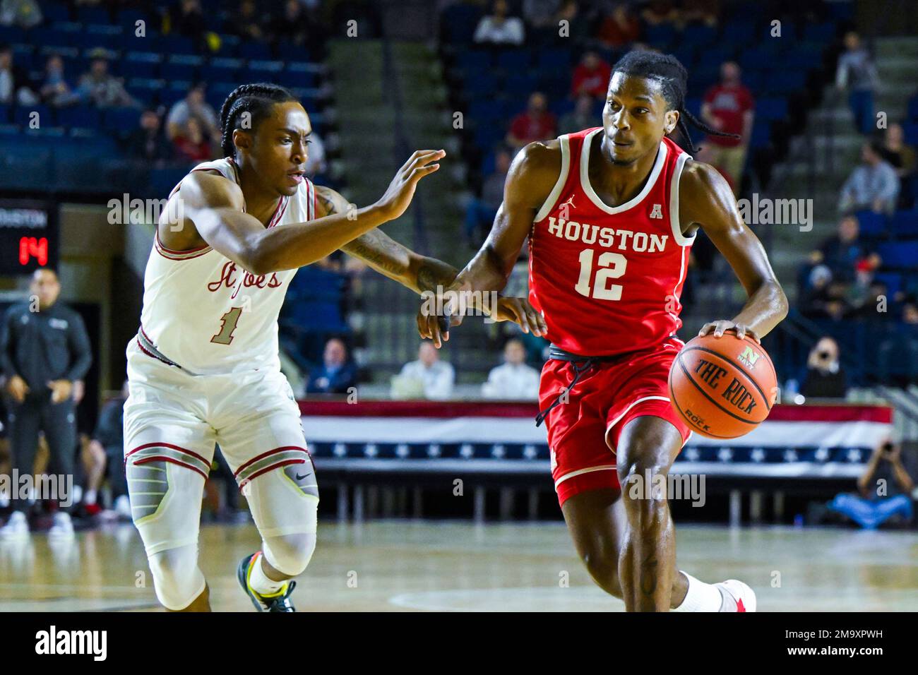 Houston guard Tramon Mark (12) handles the ball against Saint Joseph's ...