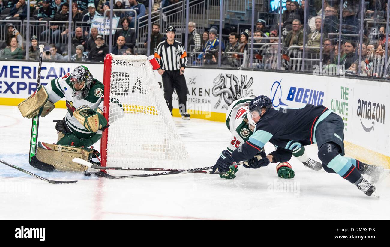 Minnesota Wild goalie Marc-Andre Fleury, left, knocks away a shot by ...