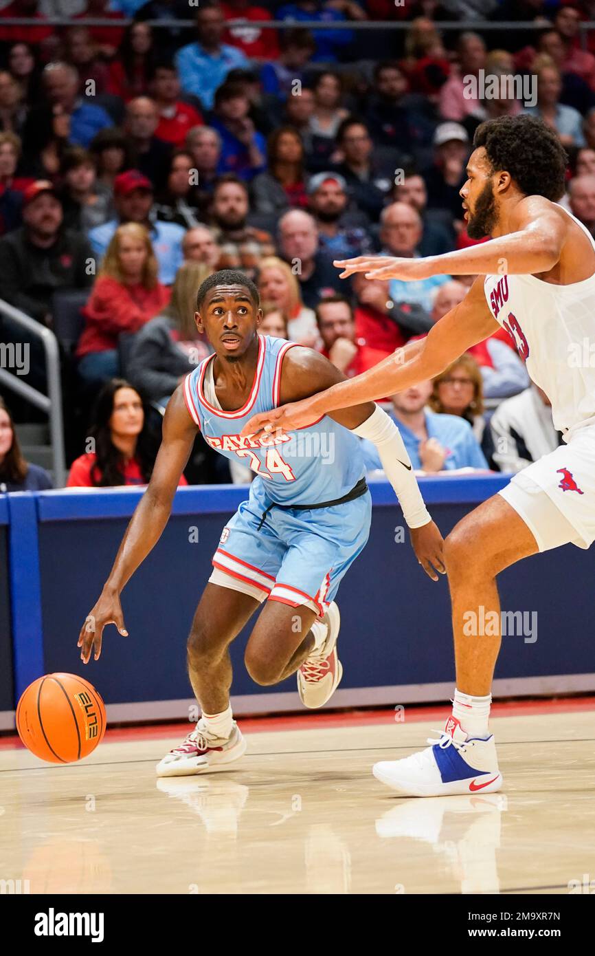 Dayton guard Kobe Elvis (24) dribbles the ball as SMU forward Efe ...