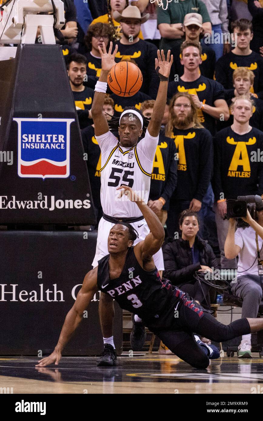 Penn's Jordan Dingle, bottom, shoots from the floor under Missouri's ...