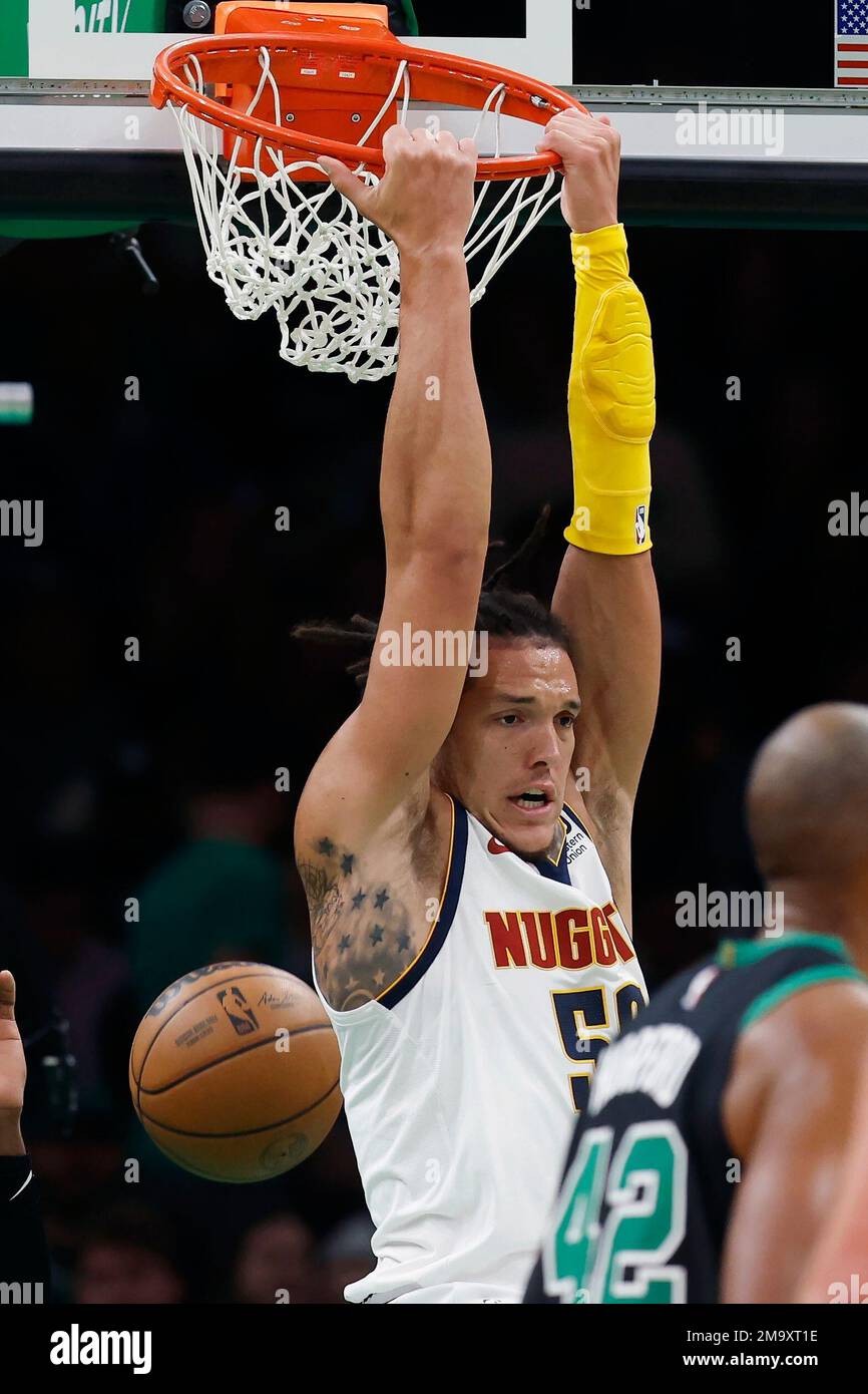 Denver Nuggets' Aaron Gordon (50) makes a reverse dunk during the first ...